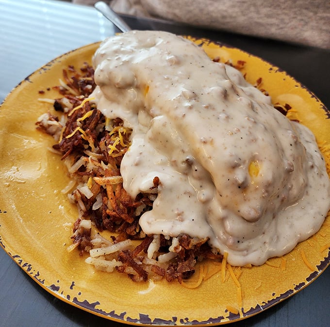 Cowboy Bennies – where home fries and sausage gravy unite in holy matrimony. This plate doesn't just speak to you, it serenades your soul.