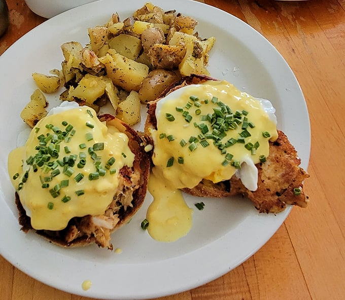 The infamous Crab Cake Benedict—where perfectly poached eggs and hollandaise conspire with crab cakes in a delicious plot against your diet.