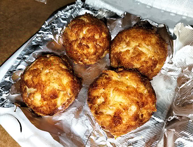 Golden-brown perfection that would make Neptune himself weep. These crab cakes are what seafood dreams are made of—mostly crab, minimal filler.