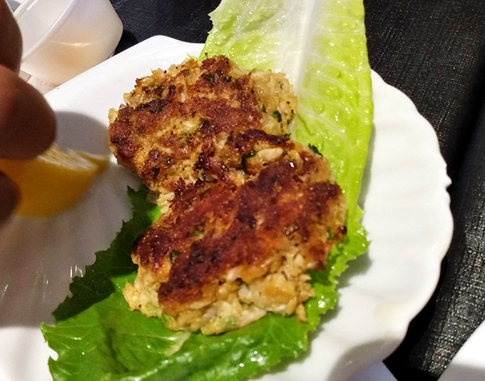 These crab cakes are what other crab cakes dream of becoming when they grow up—more crab than cake, with a golden crust that audibly crackles with each bite.
