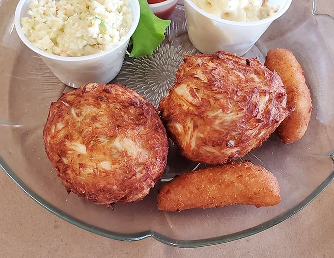 These golden-brown crab cakes are what food dreams are made of—mostly crab, minimal filler, and a crispy exterior that shatters with each bite.