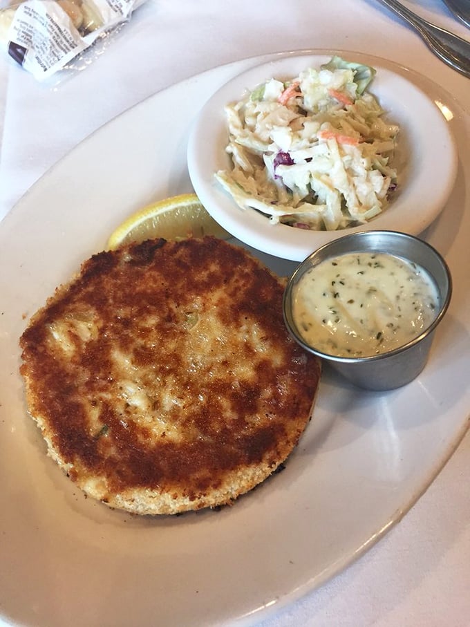 Not so much a crab cake as a crab celebration – golden-crusted perfection with barely enough breading to hold the sweet lumps together.