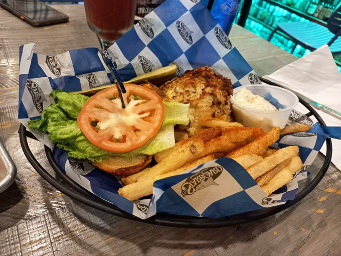 This isn't just a crab cake sandwich—it's Delaware diplomacy on a plate, brokering peace between Maryland purists and Pennsylvania bread-lovers with every perfect bite. 