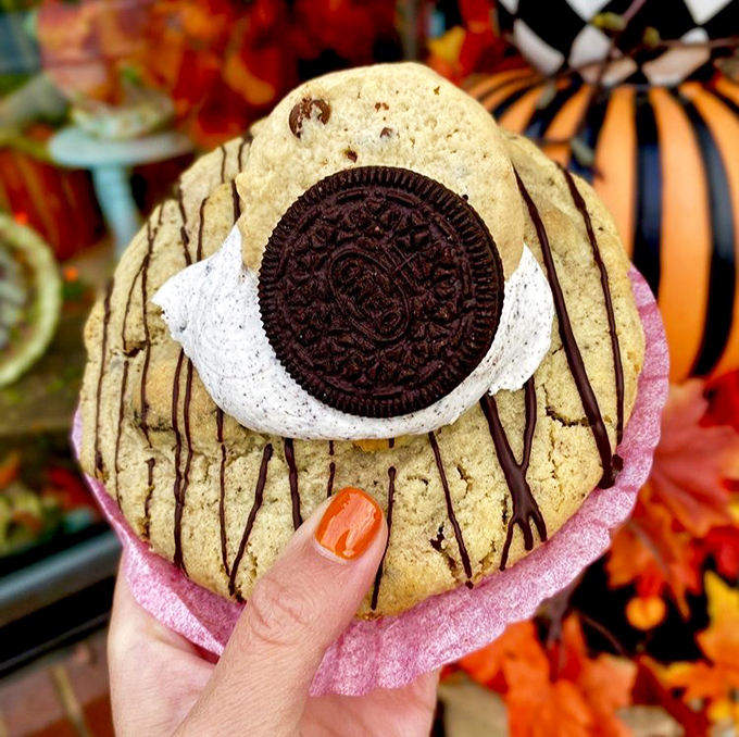 Cookie architecture at its finest—a golden base, chocolate drizzle, and an Oreo crown create a dessert that's basically three treats having a delicious summit meeting.