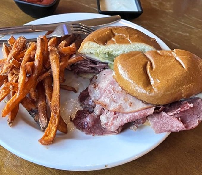 The Cuban that launched a thousand road trips. Those sweet potato fries aren't just a side dish—they're a supporting actor deserving their own award.
