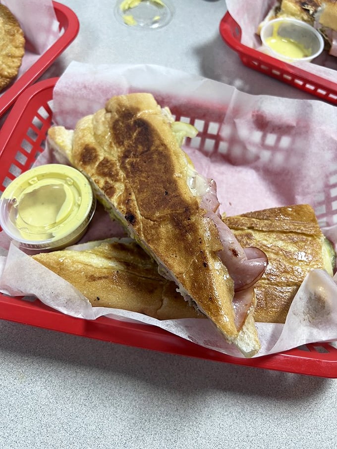 This isn't just toast—it's a masterclass in the art of pressing. Golden, crispy exterior giving way to a melty interior that whispers, "Buenos días, delicious."