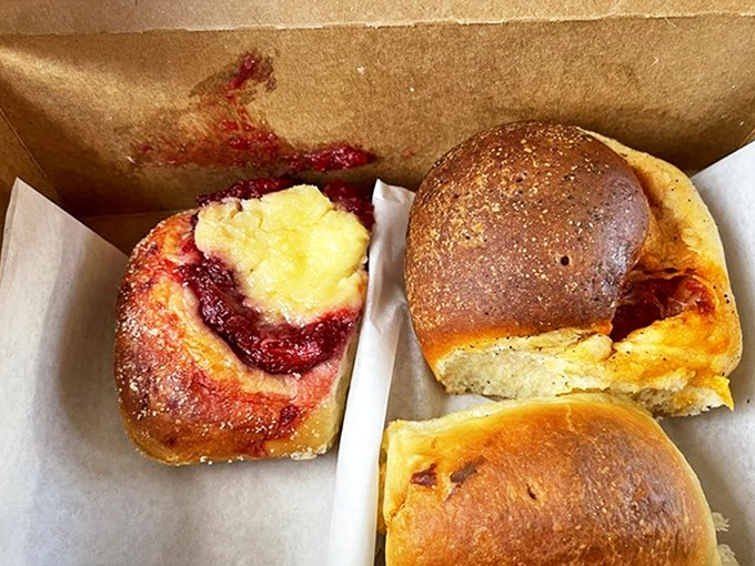 Pillowy dough cradles sweet and savory fillings – proof that sometimes the best things in life come in simple brown boxes.