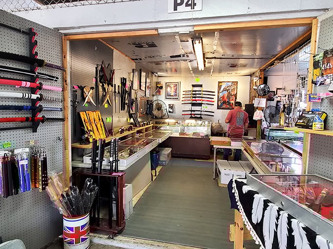 Jewelry repair signs hang like beacons of hope for family heirlooms in need of resurrection, while display cases whisper promises of hidden gems.