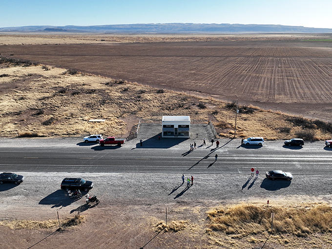 The ultimate "location, location, location" irony—luxury retail meets tumbleweeds and train tracks. Somewhere, a real estate agent is having heart palpitations.