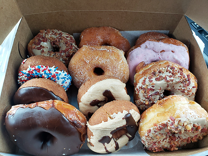 Donut nirvana in cardboard form. Each one a masterpiece of fried perfection that makes grocery store versions seem like sad, distant relatives.