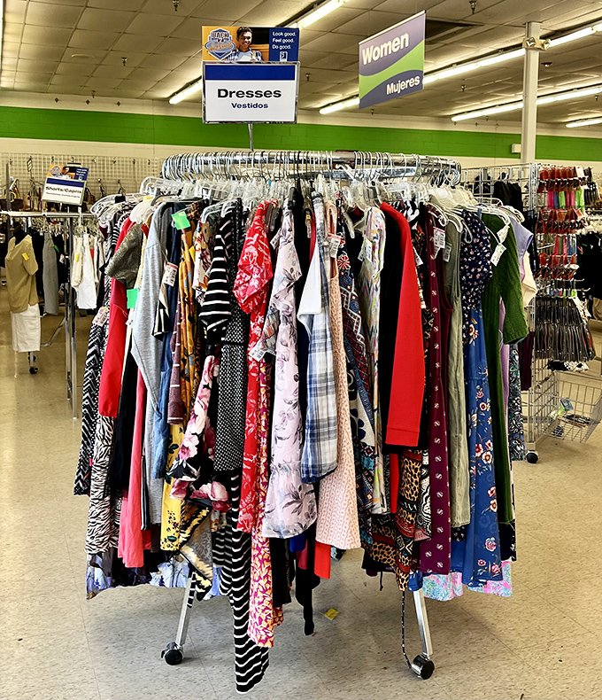 The dress carousel – where floral prints from the 90s mingle with modern stripes, creating a fashion time machine that costs less than dinner out.