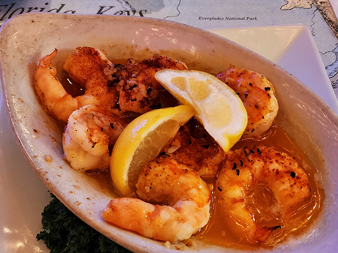 The legendary Drunken Shrimp arrive swimming in a garlicky, citrusy, boozy bath that might make you consider drinking the sauce when no one's looking.