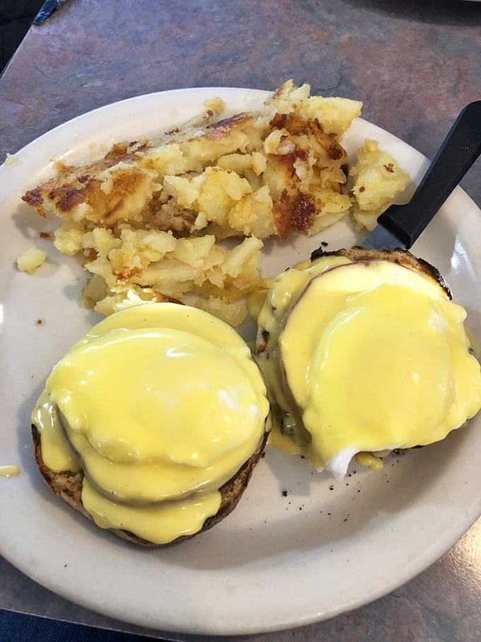 Eggs Benedict that would make a cardinal sin – perfectly poached eggs draped in hollandaise that cascades like a yellow waterfall over English muffins.