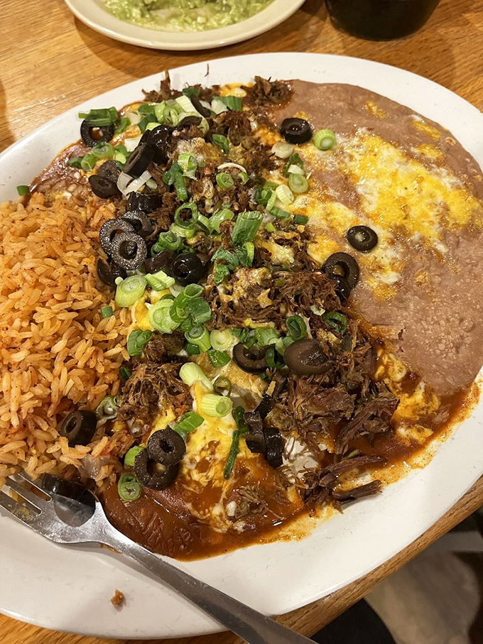 Enchiladas swimming in rich sauce that probably took hours to perfect - pure comfort food.