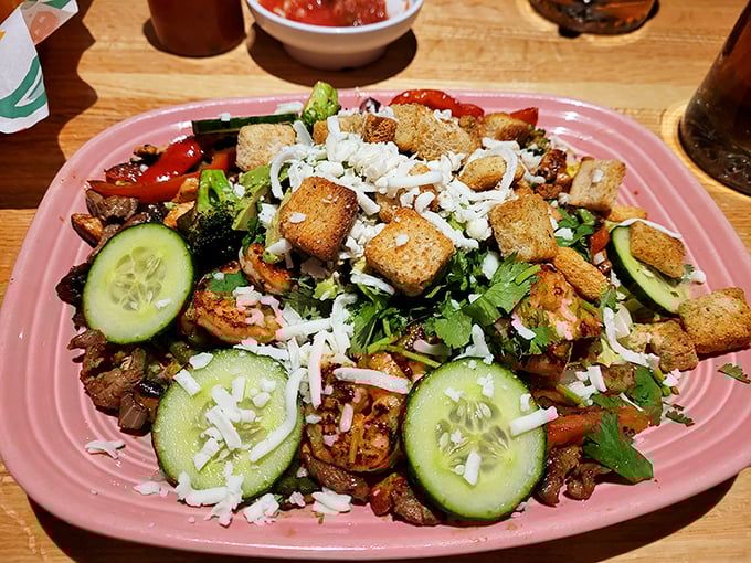 This isn't just a salad—it's a fiesta on a plate! Fresh vegetables, perfectly seasoned protein, and crispy croutons create a symphony of textures and flavors.