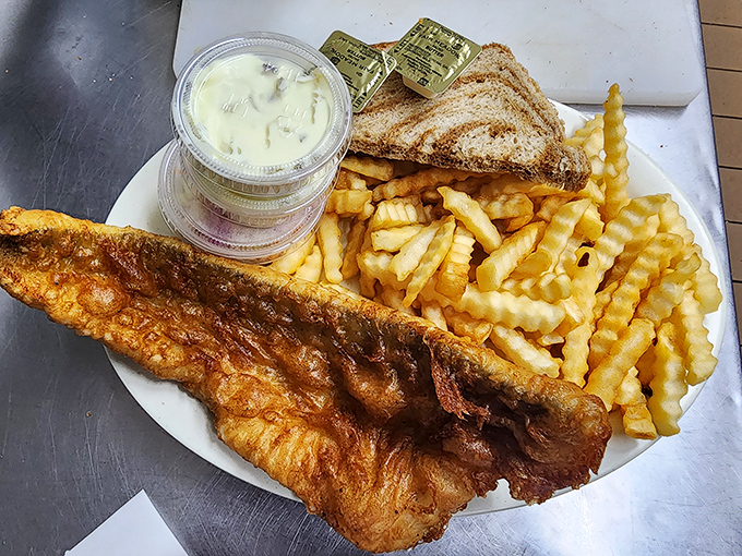 Golden-battered perfection that shatters with each bite. This isn't just fish fry – it's Wisconsin's Friday night religion on a plate.