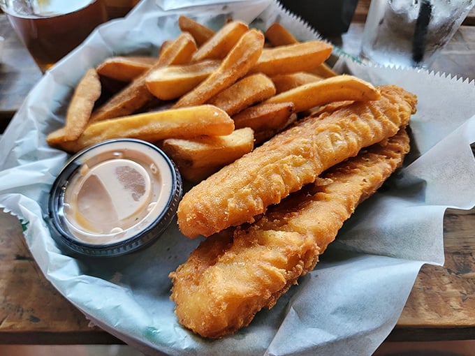 Golden, crispy perfection that shatters at first bite. These fish and chips aren't just food—they're an edible argument for taking the scenic route to Weston.