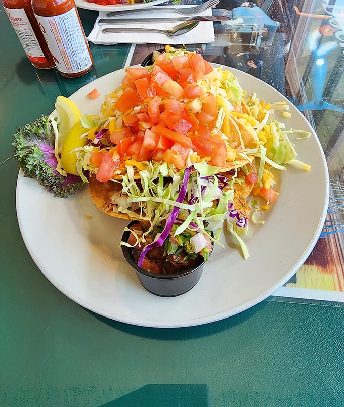 These fish tacos aren't just Instagram-pretty—they're a colorful fiesta of fresh cabbage, diced tomatoes, and perfectly cooked fish that tastes like the ocean just blew you a kiss.