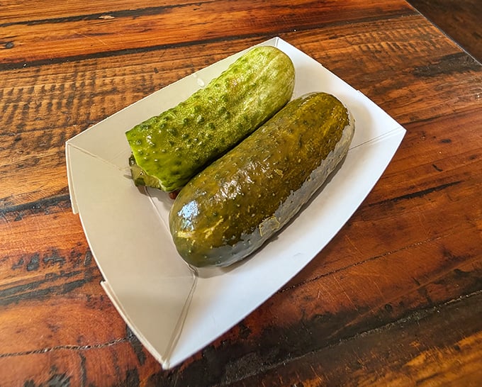 The legendary free pickles—crunchy, garlicky ambassadors of goodwill that have launched a thousand meals and zero regrets.