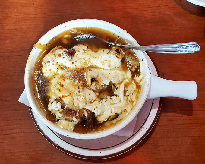 Behold the star attraction: French onion soup with cheese that performs an Olympic-worthy stretch with every spoonful. Comfort in a crock.