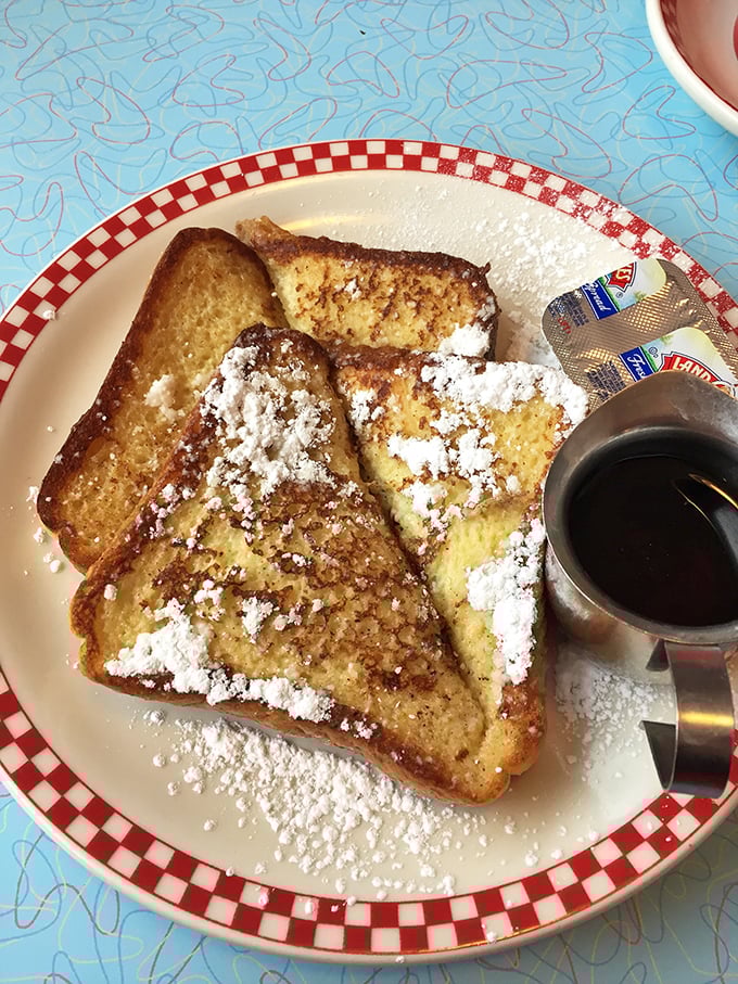 French toast that's achieved the perfect golden-brown exterior while maintaining that custardy interior—the breakfast equivalent of winning the lottery.