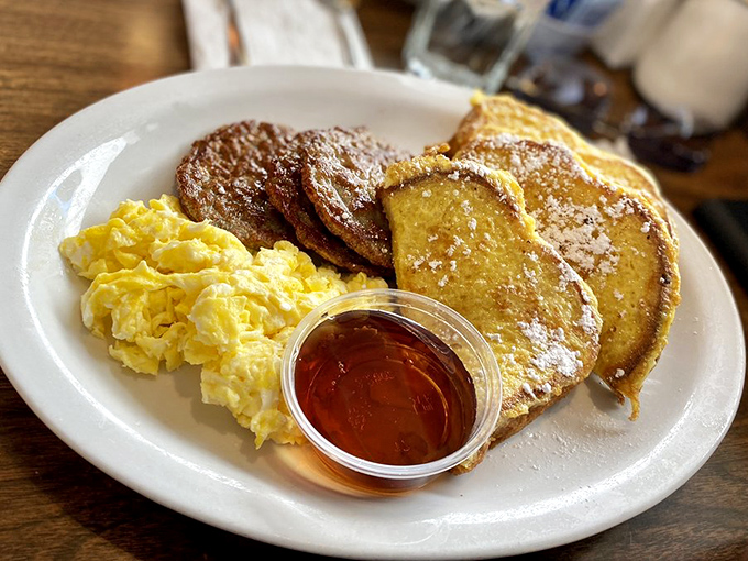 Golden French toast that's crisp at the edges, cloud-soft in the middle—proof that simple pleasures are often the most profound.