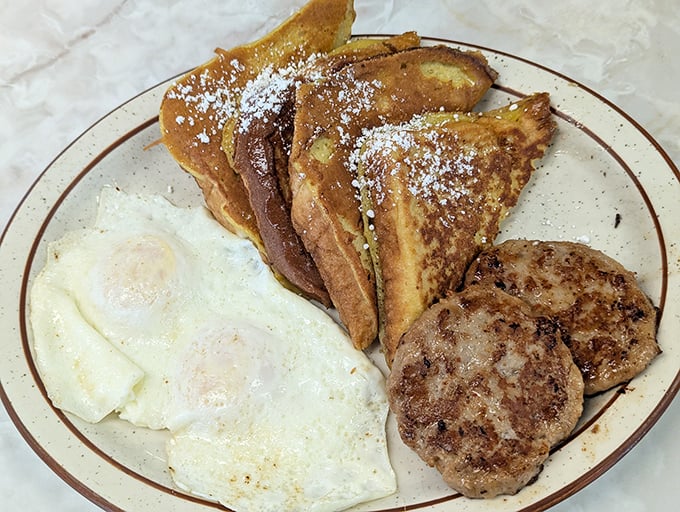 This French toast could make Julia Child weep tears of joy – golden perfection with a side of breakfast bliss.