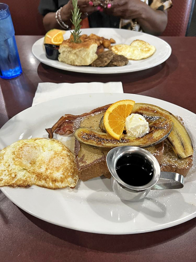 French toast that makes ordinary breakfast weep with inadequacy, crowned with caramelized bananas and a sprig of rosemary for dramatic effect.