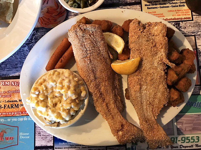 Golden-brown perfection on a plate. This cornmeal-crusted catfish is the kind of dish that makes conversation stop and eyes close in appreciation.