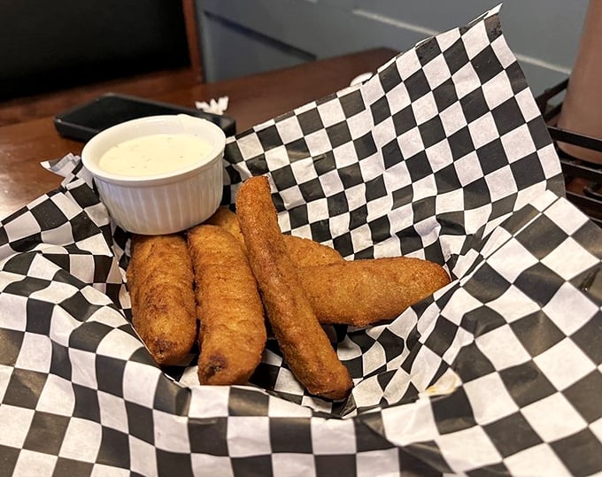 These golden-battered pickle spears aren't just appetizers—they're life-affirming moments of crispy-tangy perfection that make you question why you'd ever eat pickles any other way.