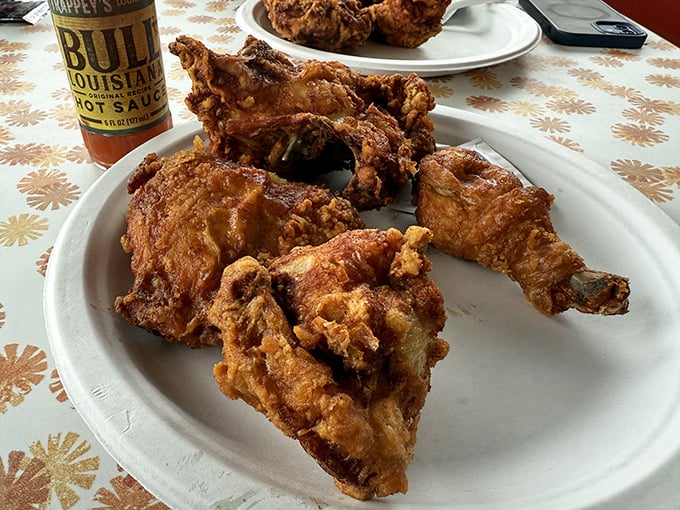 Golden-brown perfection that makes you want to write poetry. This broasted chicken's crackling skin gives way to juicy meat that's worth every napkin.