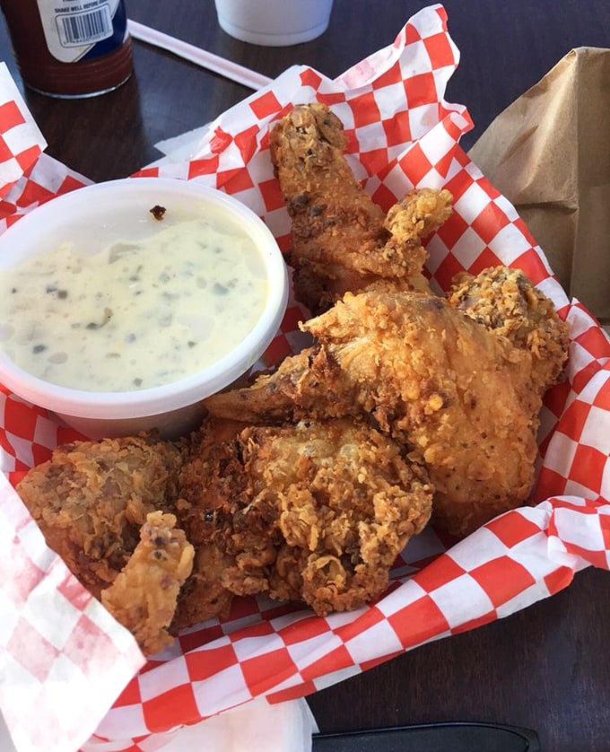 Golden-brown perfection that makes other fried chicken look like it's not even trying. That crust deserves its own fan club and possibly a small parade.