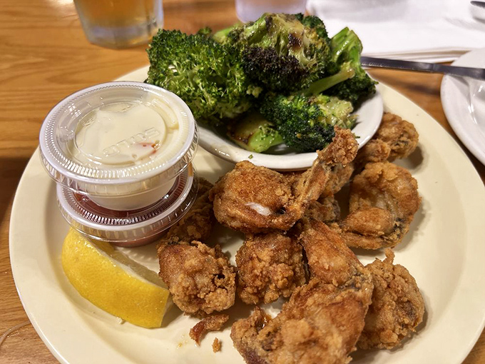 Golden perfection on a plate - these frog legs will make you a believer in amphibian cuisine.