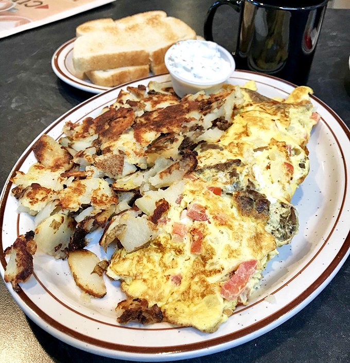 Breakfast nirvana on a plate! This omelet doesn't just satisfy hunger—it creates the kind of morning memory that has you planning your next visit.