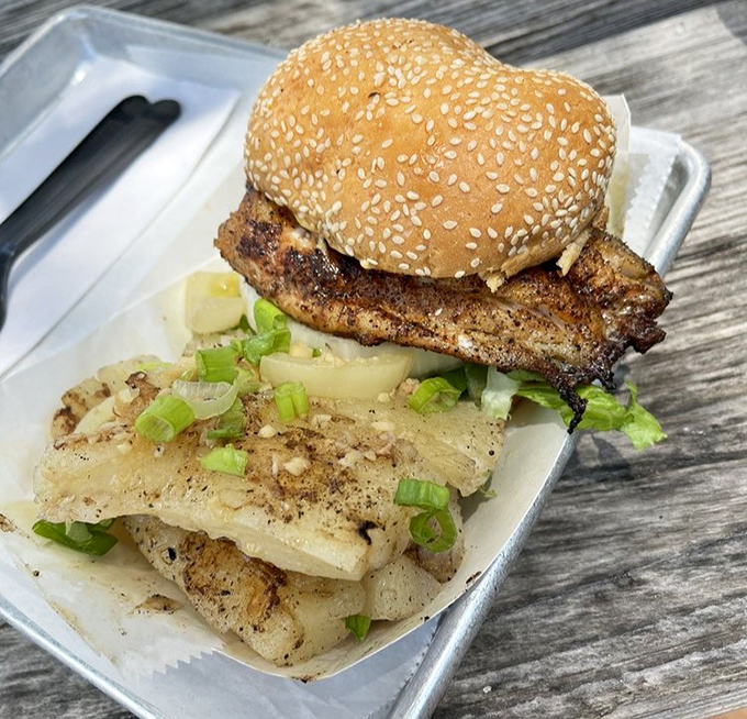 This blackened grouper sandwich doesn't just satisfy hunger—it creates memories. Paired with seasoned fries, it's Tampa Bay's answer to culinary nirvana.