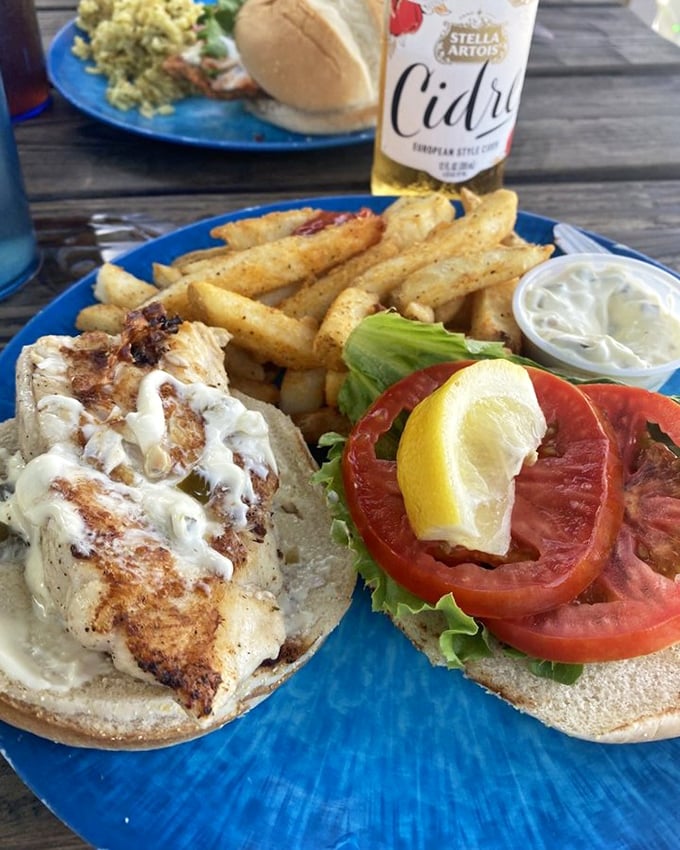 Sandwich perfection doesn't exi— Oh wait, it does! Grilled fish, fresh tomato, crispy fries, and that sauce… this is what vacation memories are made of.