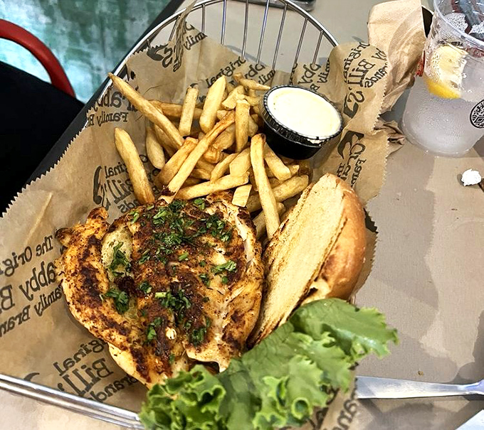 This blackened grouper sandwich isn't just lunch – it's a Florida rite of passage. Perfectly seasoned, flaky fish that makes you understand why people drive for hours to get here.