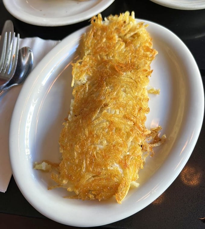 Golden, crispy perfection on a plate. These hash browns achieve that mythical balance of crunchy exterior and tender interior.