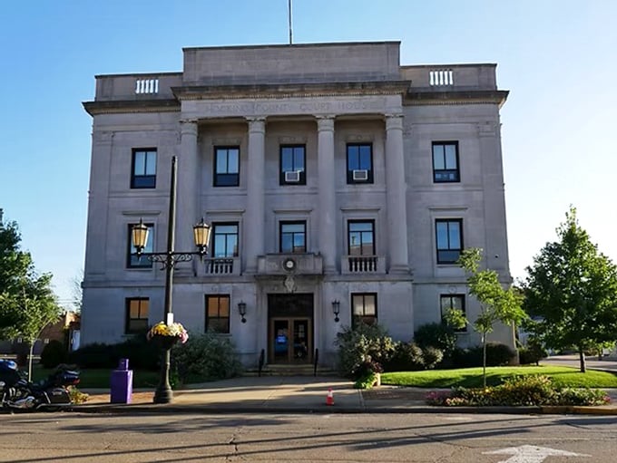Logan's courthouse commands respect with its stately columns and limestone presence, like a miniature Capitol building that got happily lost in the hills.