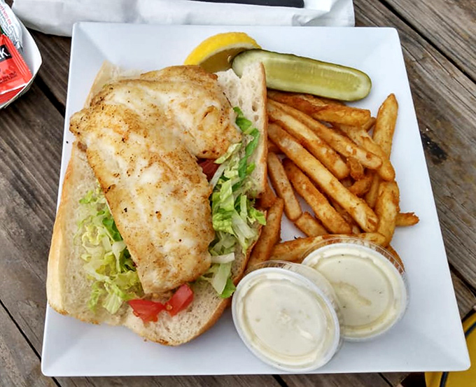 That fish sandwich isn't just lunch—it's Florida sunshine on a plate. Crispy, flaky perfection with fries that demand to be dunked.