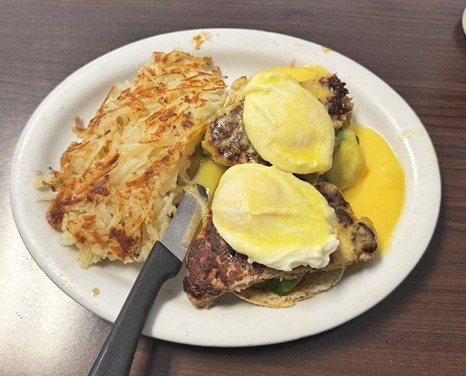 This Benedict means business – when hollandaise meets spicy turkey sausage, angels sing backup.