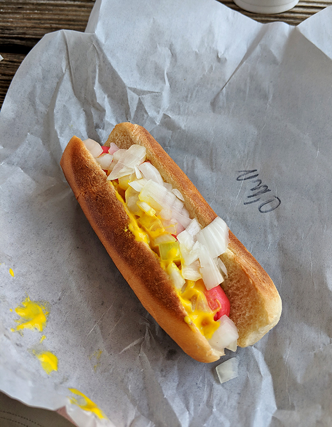 Hot dog perfection doesn't need fancy toppings—just the right balance of snap, softness, and that signature yellow mustard that somehow tastes better here than anywhere else.