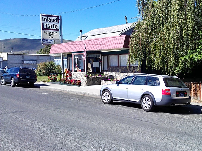 The Inland Cafe promises the kind of hearty breakfast that fuels mountain adventures – or just really satisfying naps. Those flower boxes aren't lying about the hospitality inside.