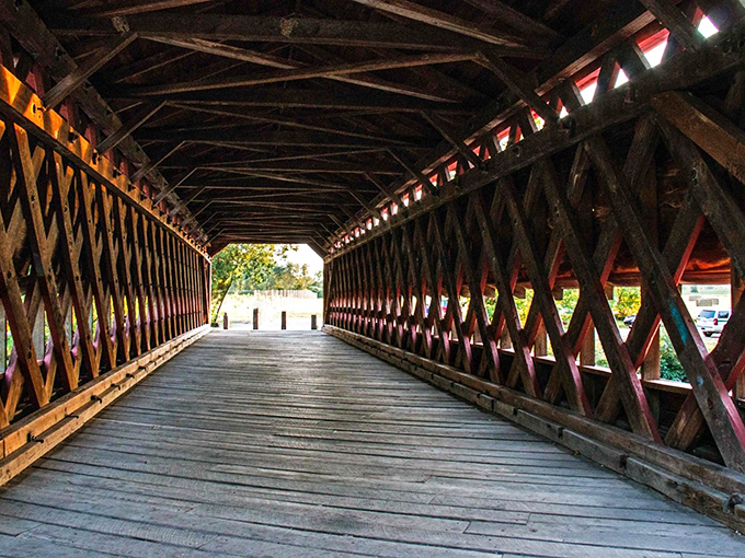 Step inside and you're walking the same planks as Civil War soldiers once did—the lattice truss design creating a mesmerizing tunnel through time.