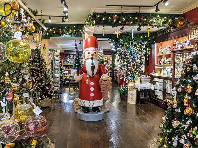 Inside, a life-sized nutcracker stands guard over a wonderland of ornaments and greenery. Santa's German cousin, perhaps?