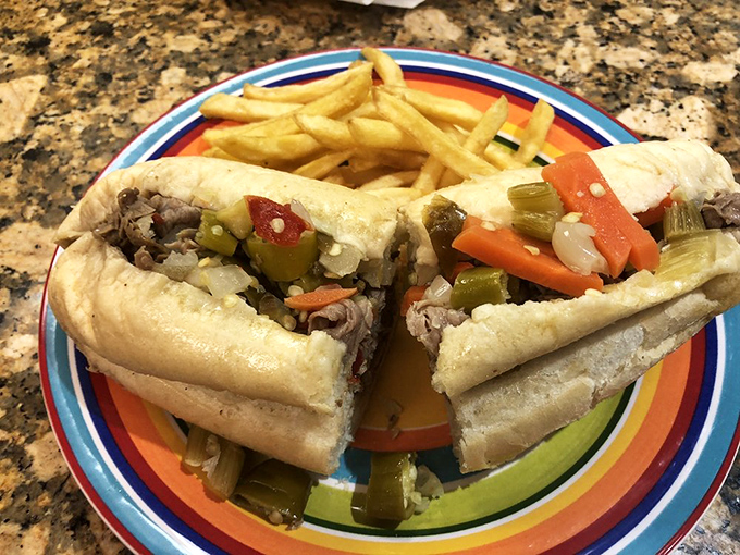 The star attraction in all its glory – thinly sliced beef, giardiniera, and that perfectly soaked French roll. This is sandwich architecture at its finest.