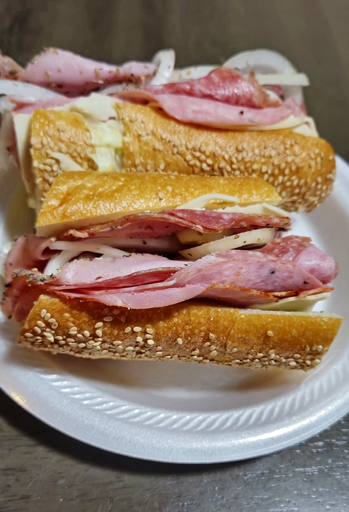 Layer upon glorious layer of Italian meats and cheese on sesame-studded bread—a sandwich that makes you wonder why you'd ever eat anything else.