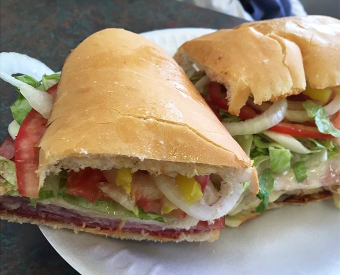 Behold the Italian sub in all its glory—layers of meat, cheese, and veggies creating the perfect harmony that makes taste buds sing.