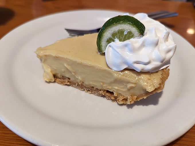That key lime pie slice could negotiate world peace with its perfect tart-to-sweet ratio.