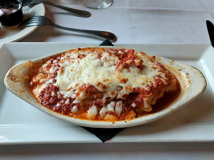 Lasagna that doesn't know the meaning of restraint – layers of pasta, cheese, and sauce in a bubbling oval of comfort that hugs you from the inside.